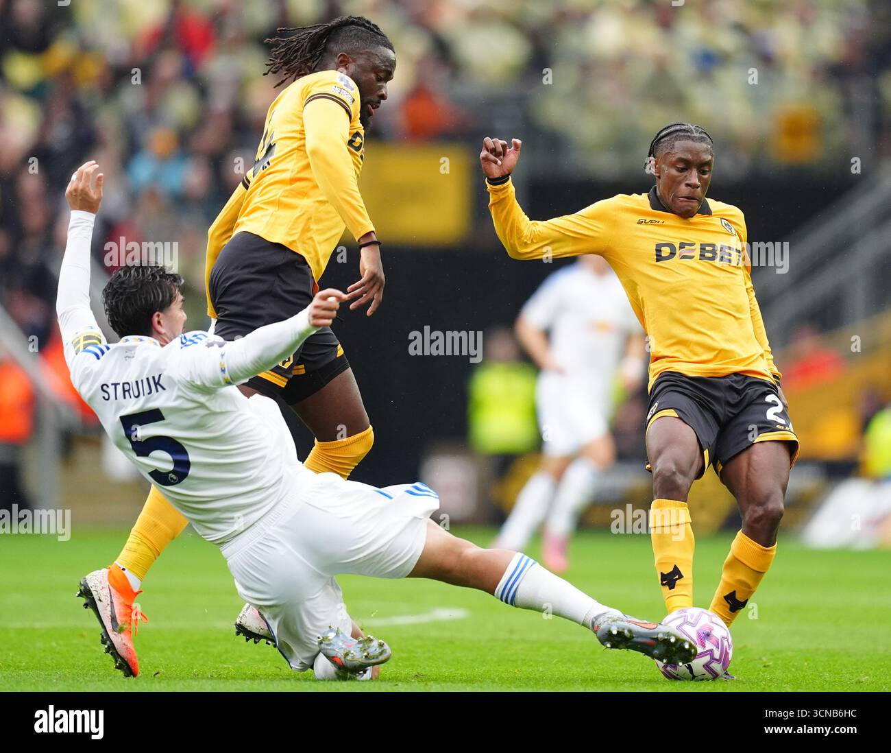 Leeds United's Pascal Struijk (left) and Wolverhampton Wanderers' Jean ...