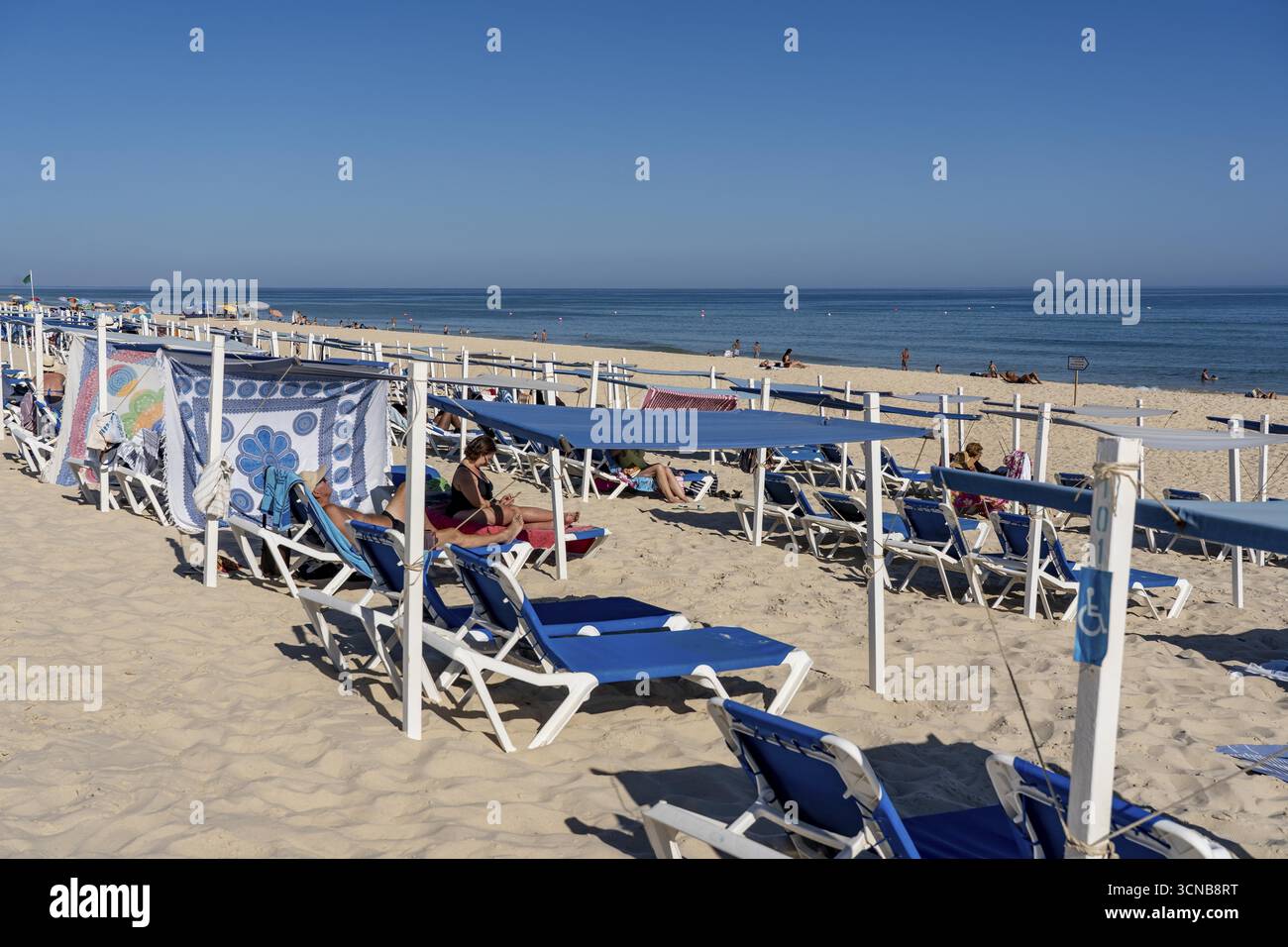 Kilometre-long sandy beach Praia do Barril, on the island off Santa ...