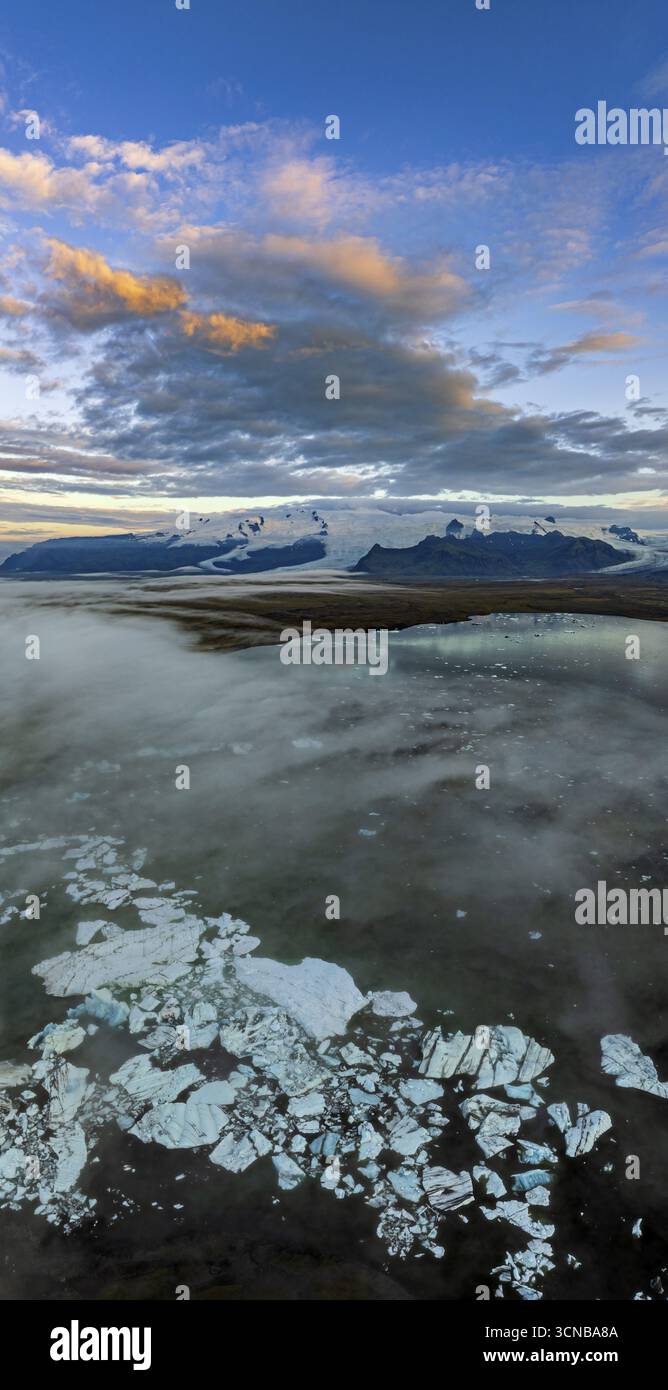 Ice floes, glacier, glacier lake, glacier lagoon, morning light, cloudy ...
