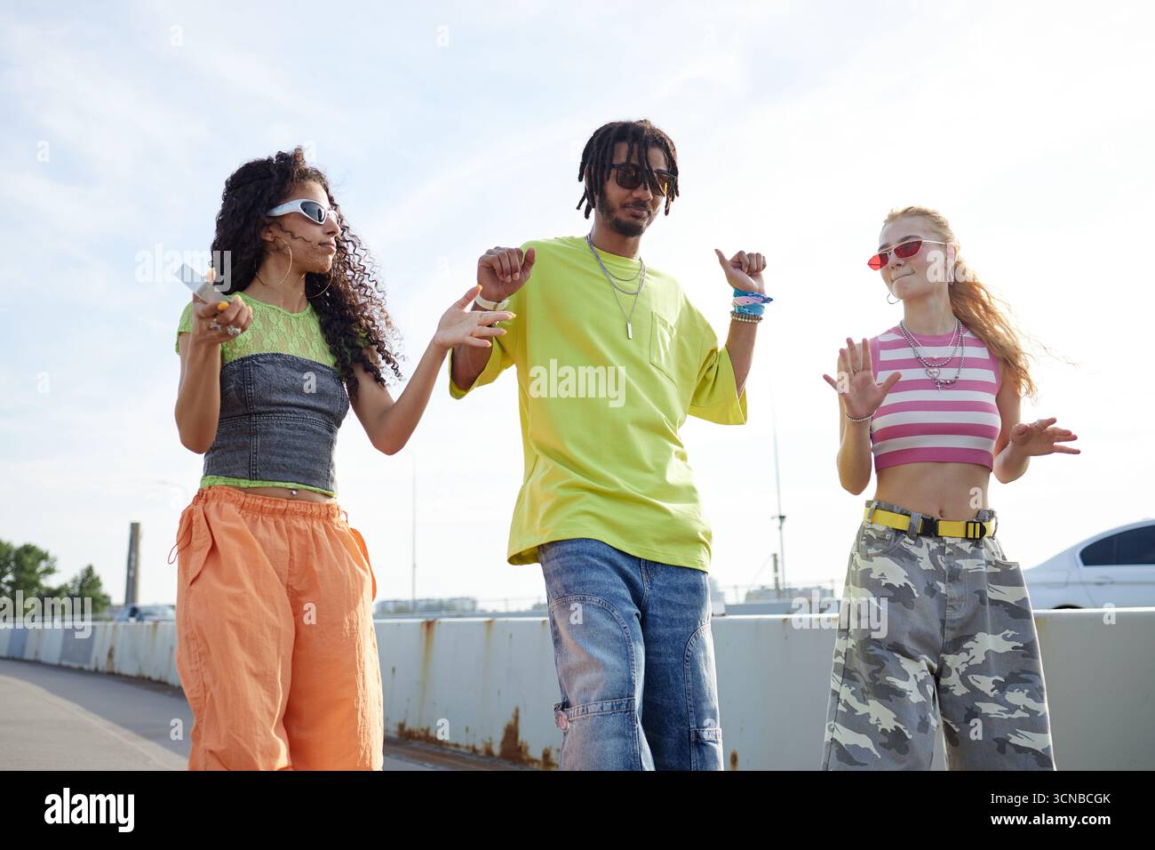 Multiethnic Gen Z Friends Dancing Outdoors Expressing Joyful Friendship ...
