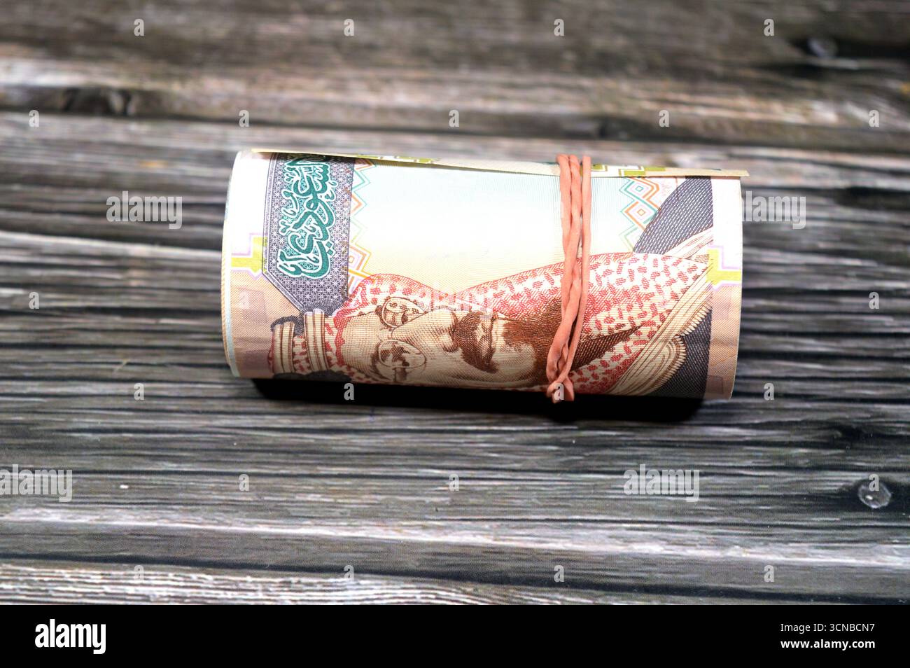 200 SAR two hundred Saudi Arabia riyal cash money banknote bills roll ...