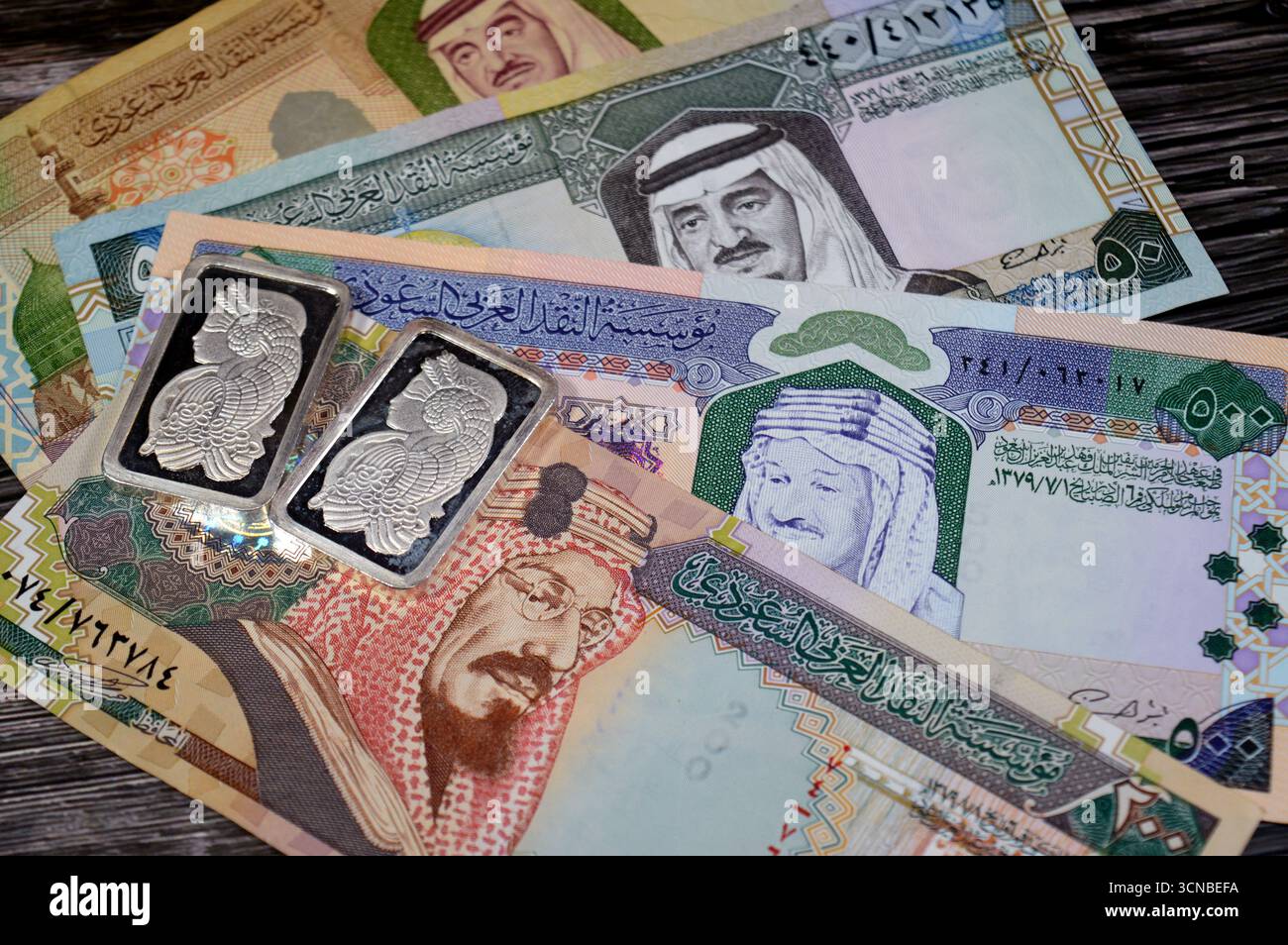 Old Saudi Arabian money banknotes of riyals and Silver precious metal ...