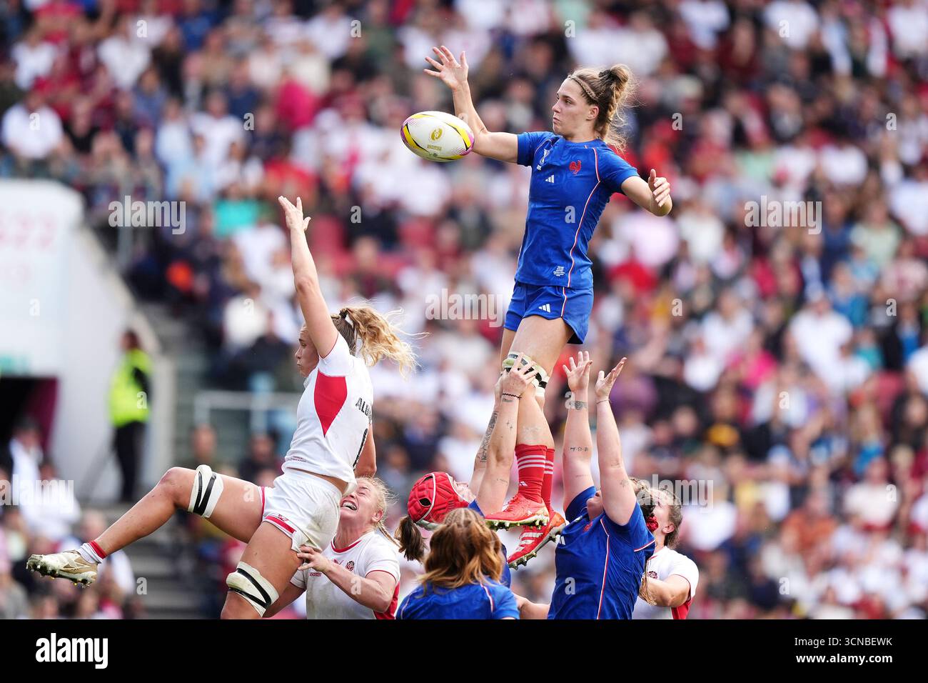 France's Lea Champon (right) competes in the line out during the Women ...