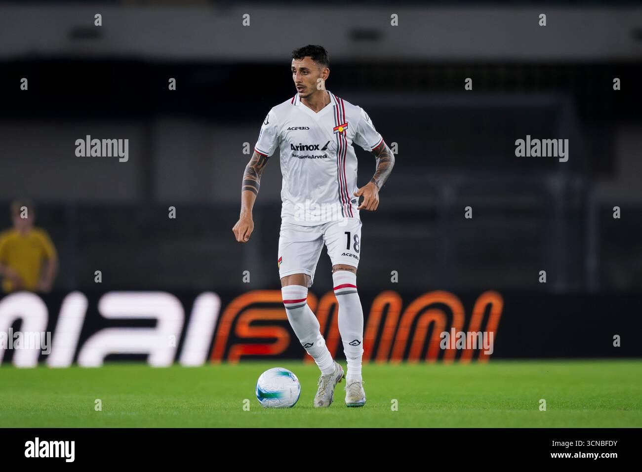 Michele Collocolo of US Cremonese in action during the Serie A football match between Hellas ...