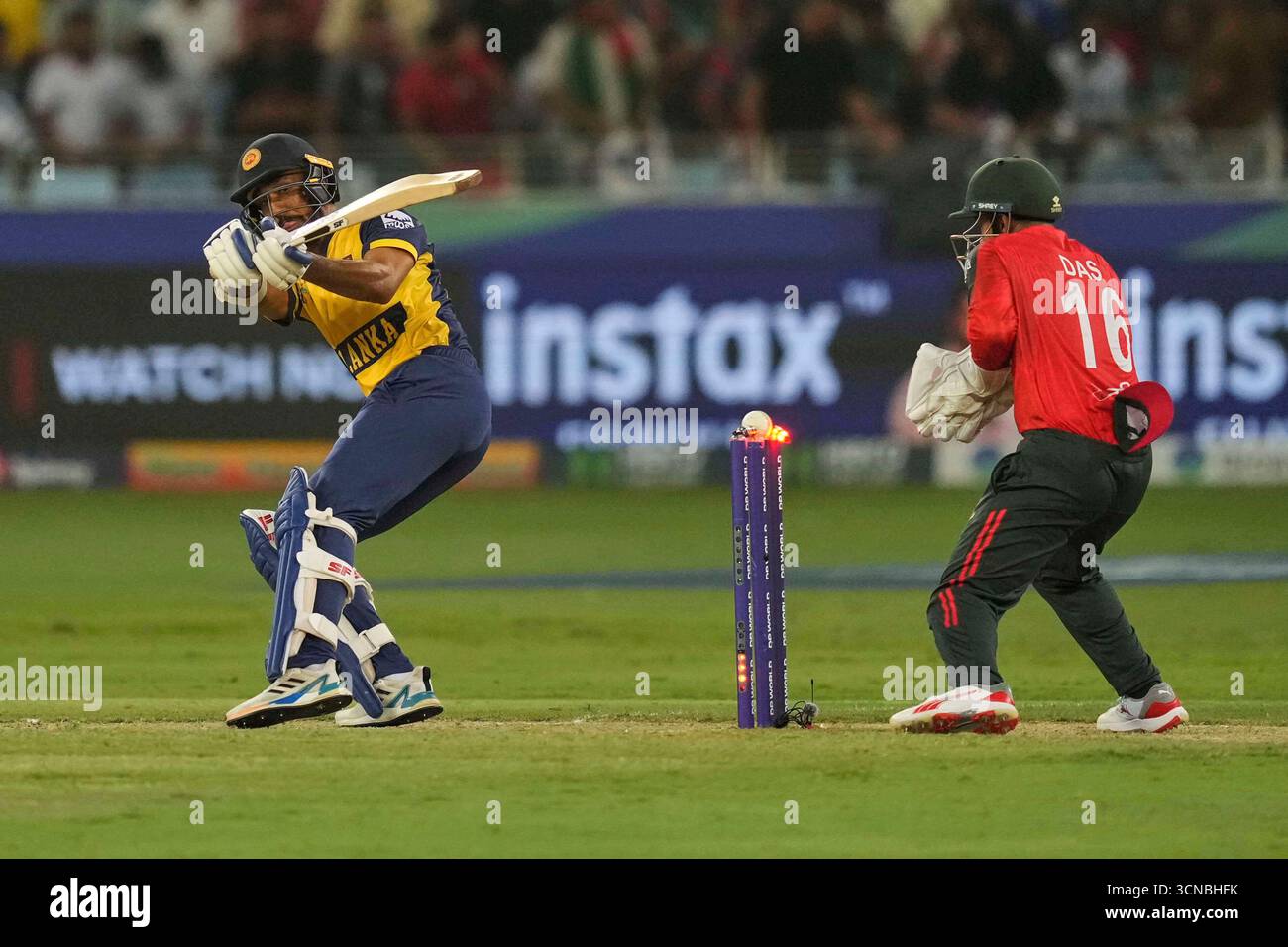 Sri Lanka's Kamil Mishara is bowled out by Bangladesh's Mehedi Hasan ...