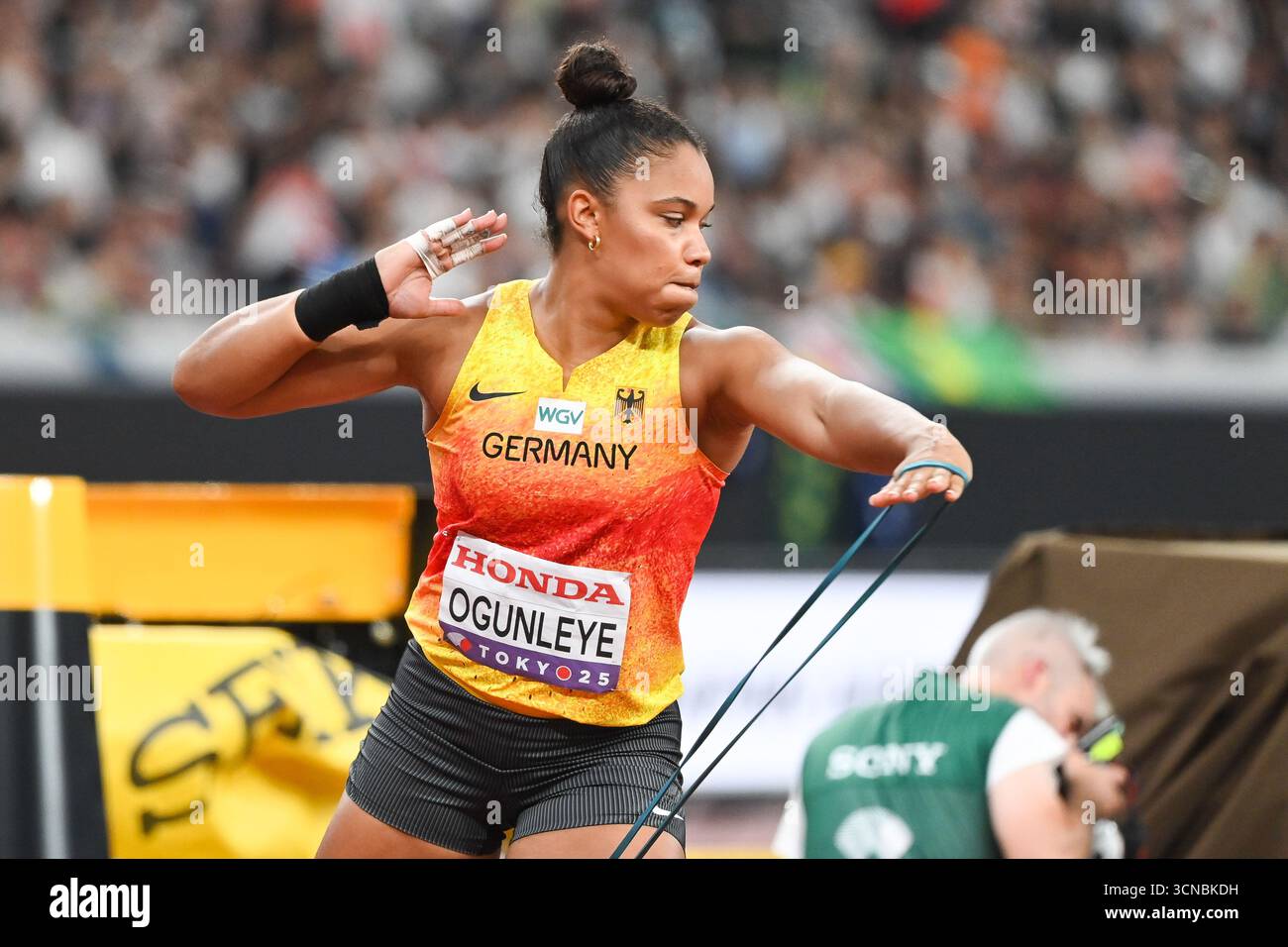 Yemisi Ogunleye (Germany) doing some routine moves during the shot put ...