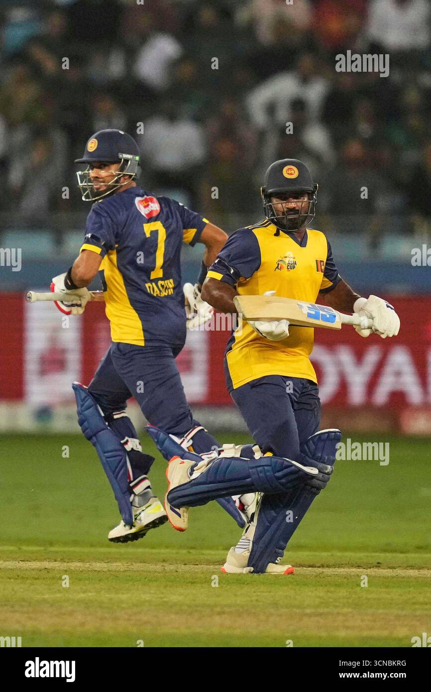 Sri Lanka's Dasun Shanaka, left, and batting partner Kusal Perera run ...