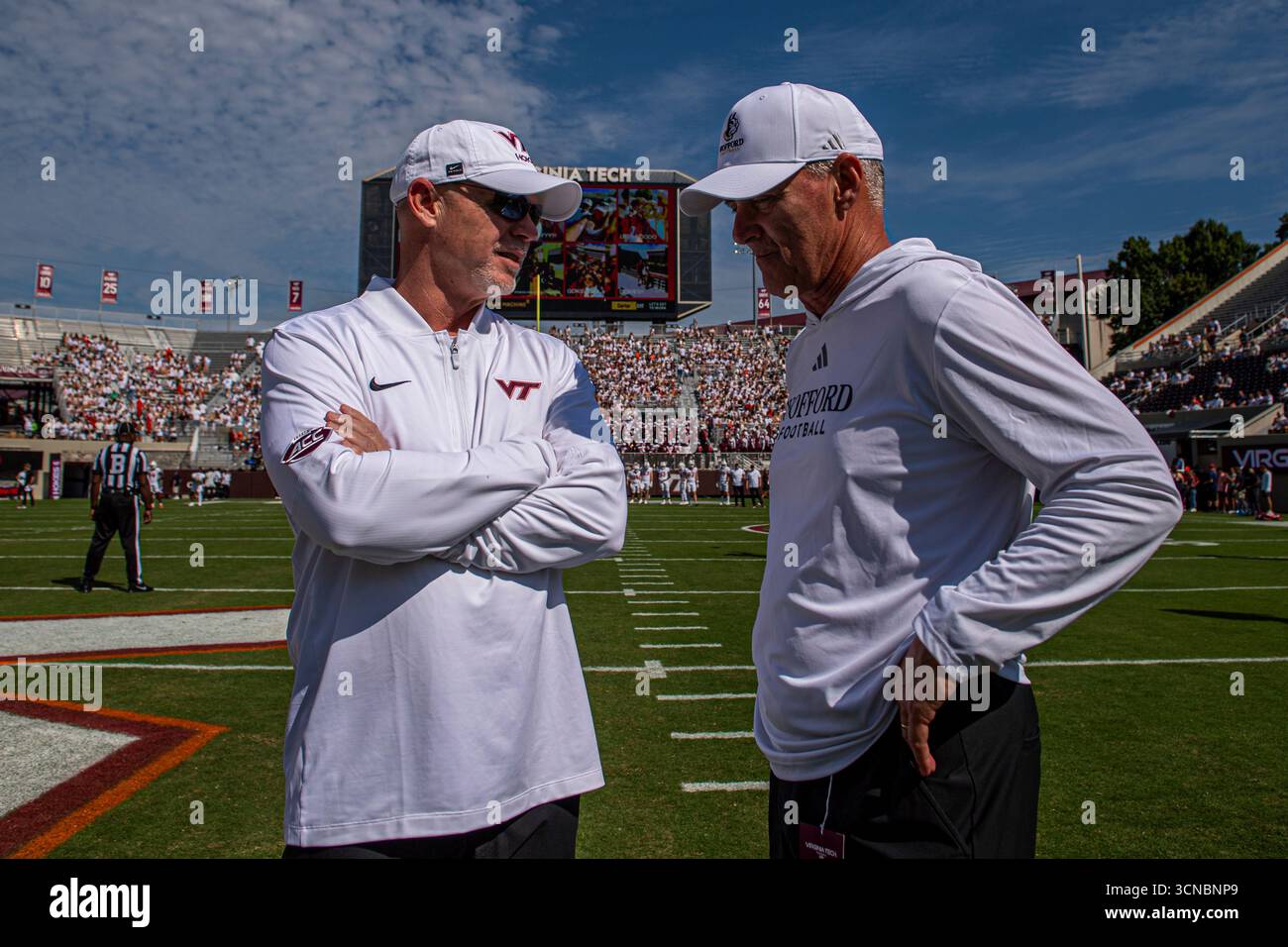 Virginia Tech head coach Philip Montgomery meets Wofford head coach ...