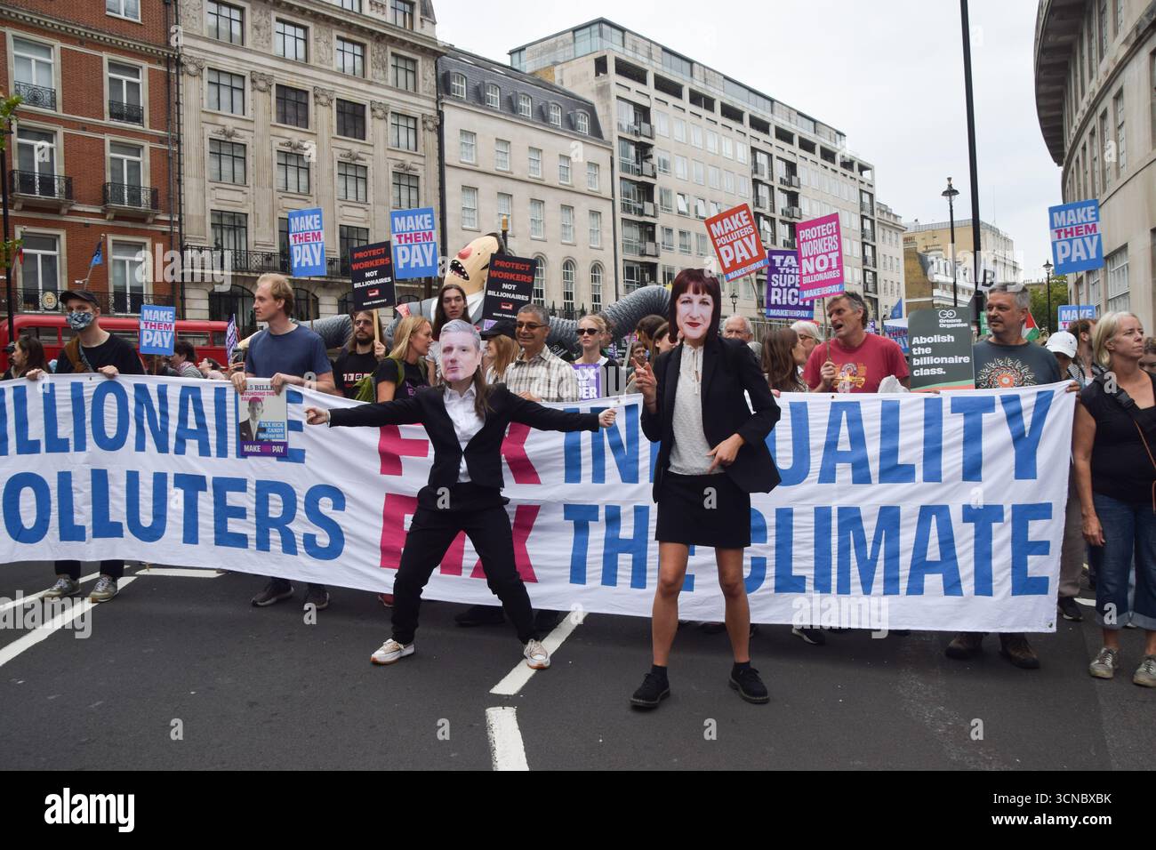London, UK. 20th September 2025. Protesters wearing Keir Starmer and ...