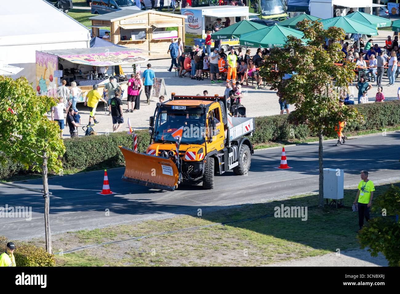 20 September 2025, Bavaria, Marktredwitz: A snow plow is maneuvered ...