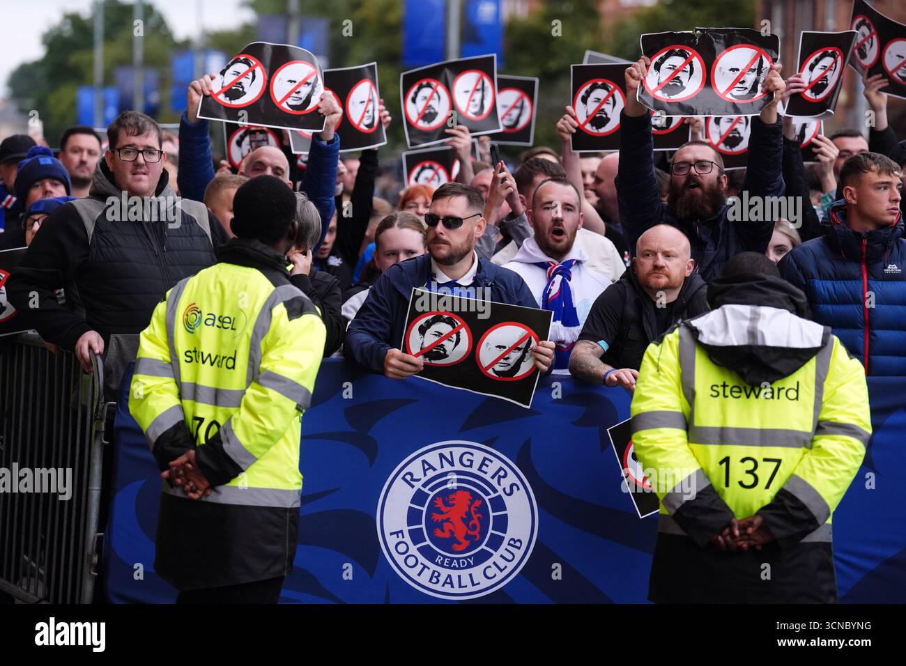 Rangers fans hold signs during a protest organised by Rangers ...