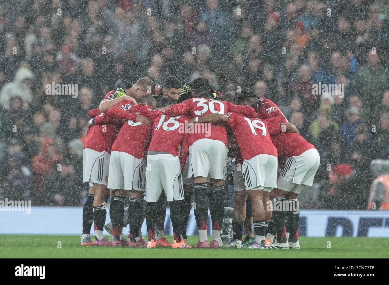 Manchester United group huddle during the Premier League match ...
