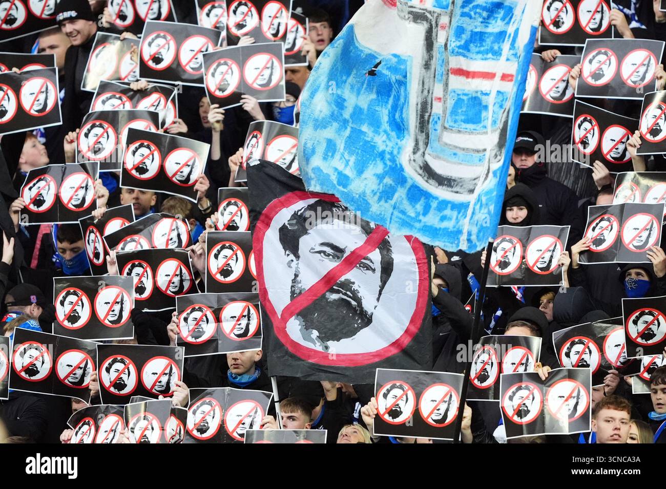 Rangers fans protest with signs in the stands against Rangers manager ...