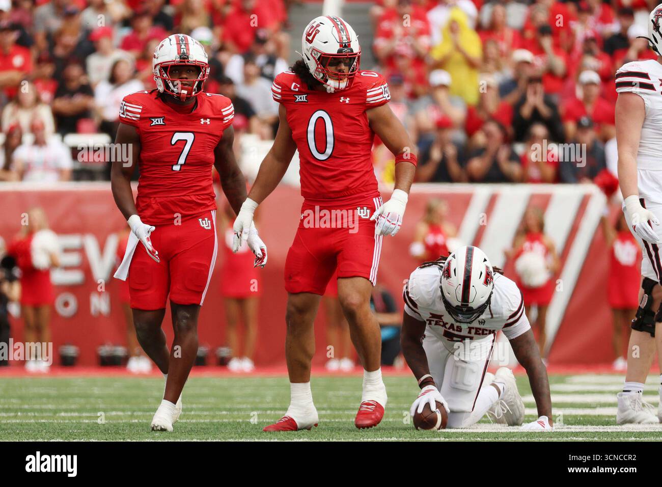 Utah linebacker Johnathan Hall and defensive end Logan Fano celebrate ...