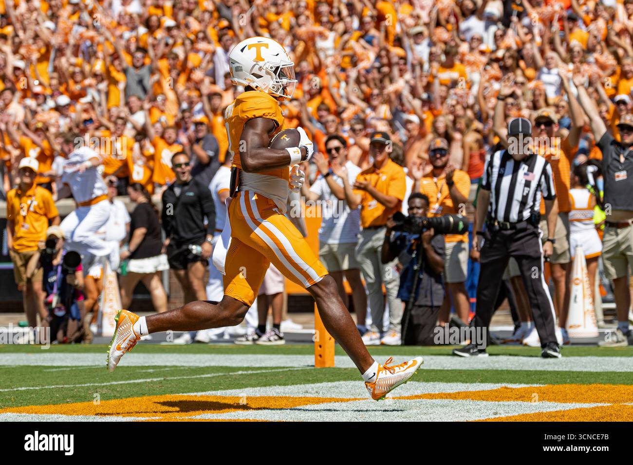 Tennessee wide receiver Mike Matthews (4) crosses the goal line a ...