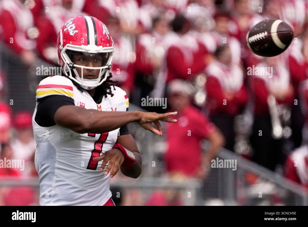 Maryland quarterback Malik Washington throws during the first half of an NCAA college football ...