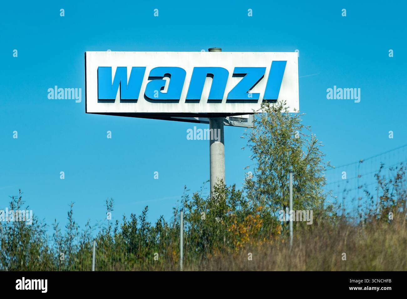 Bavaria, Germany - September 19, 2025: A company sign bearing the name ...