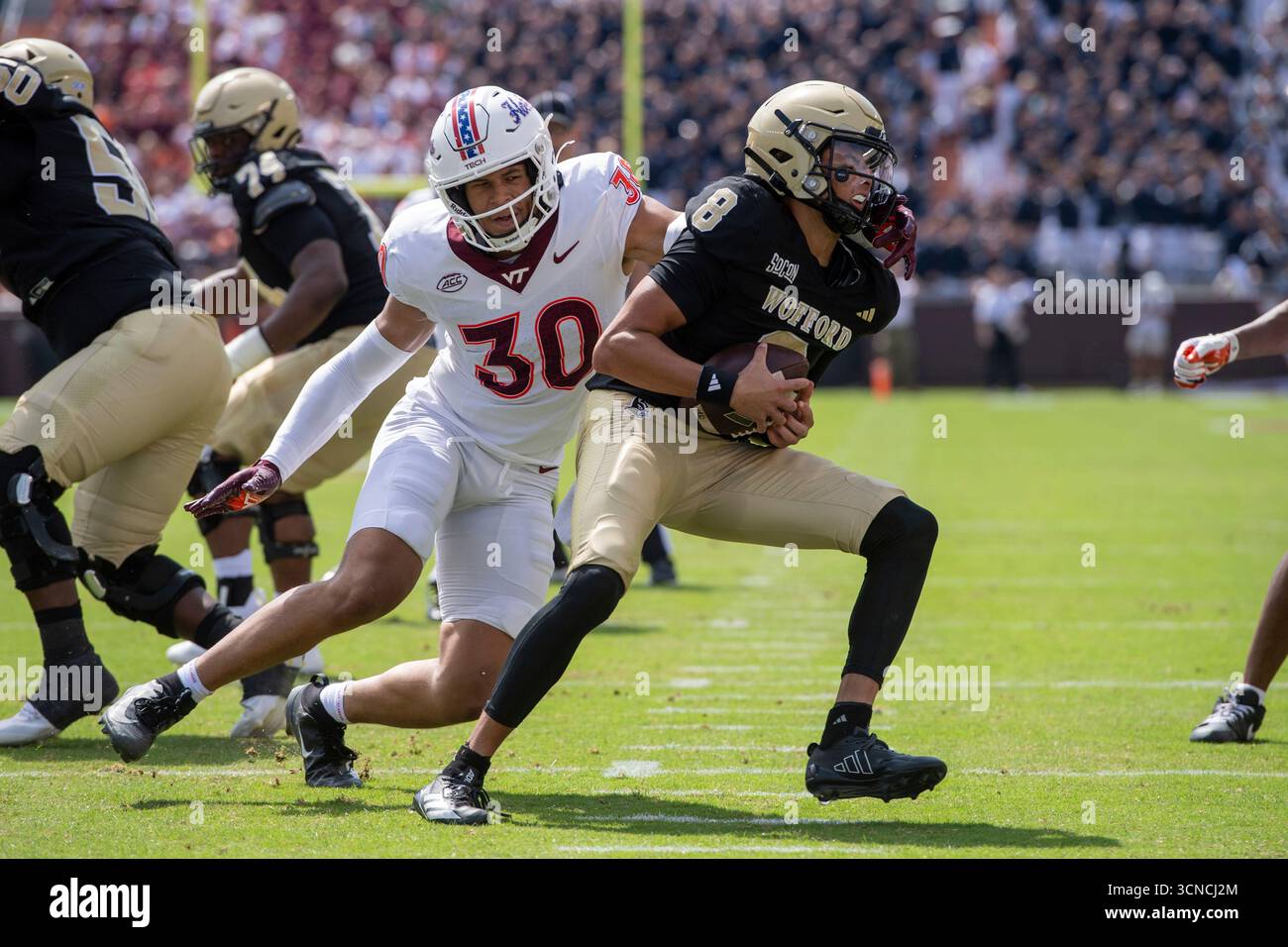 Virginia Tech linebacker Michael Short (30) pressures Wofford ...