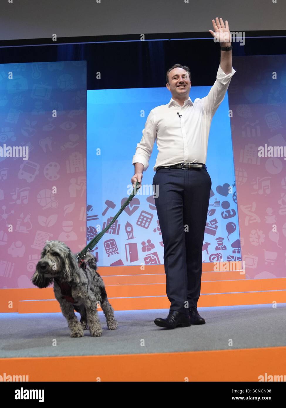 MP for Winchester Danny Chambers, with a dog call Todd, during a rally ...
