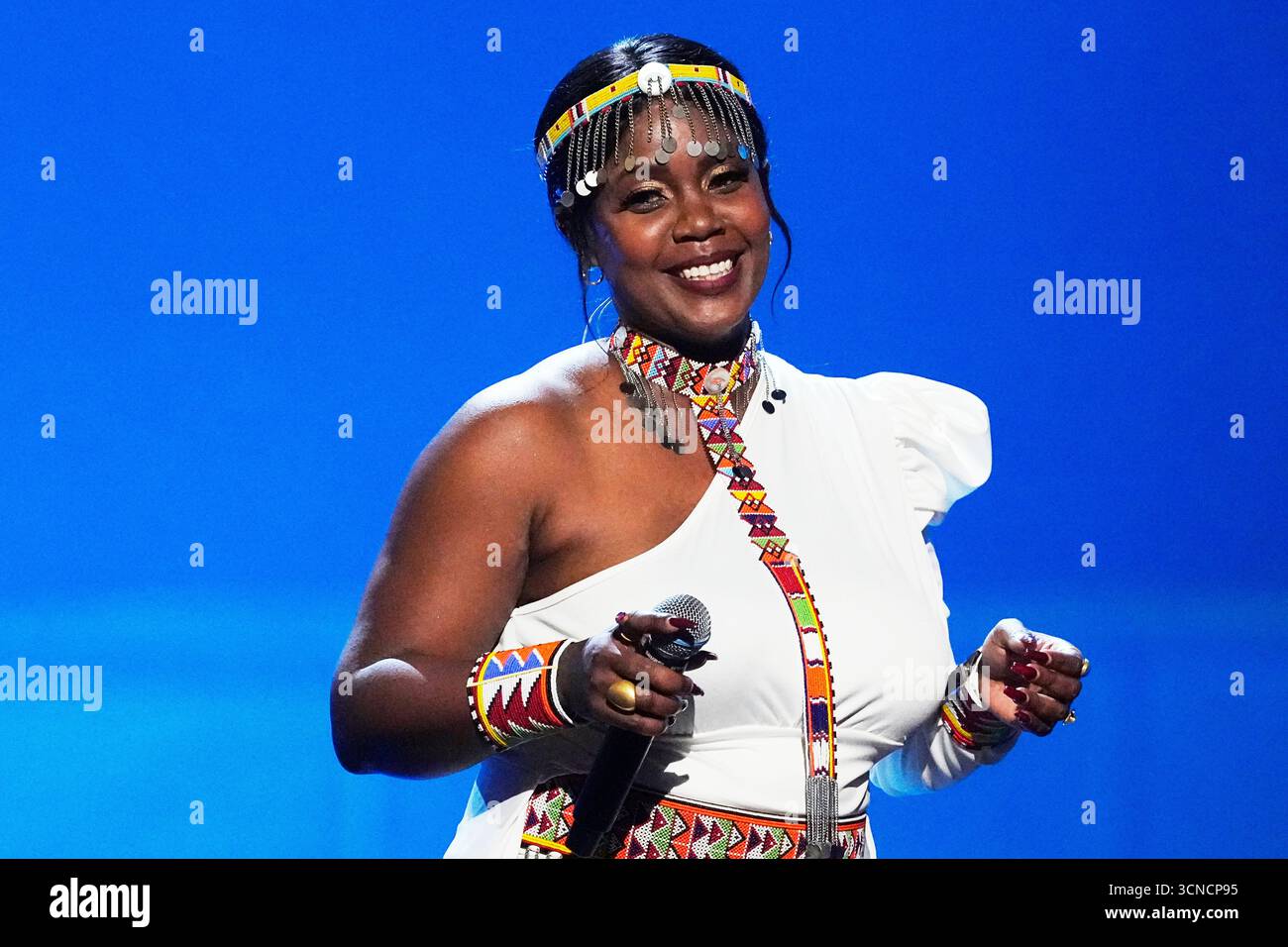 Kenya's Sanaipei Tande performs the song "Flavour" at the International ...