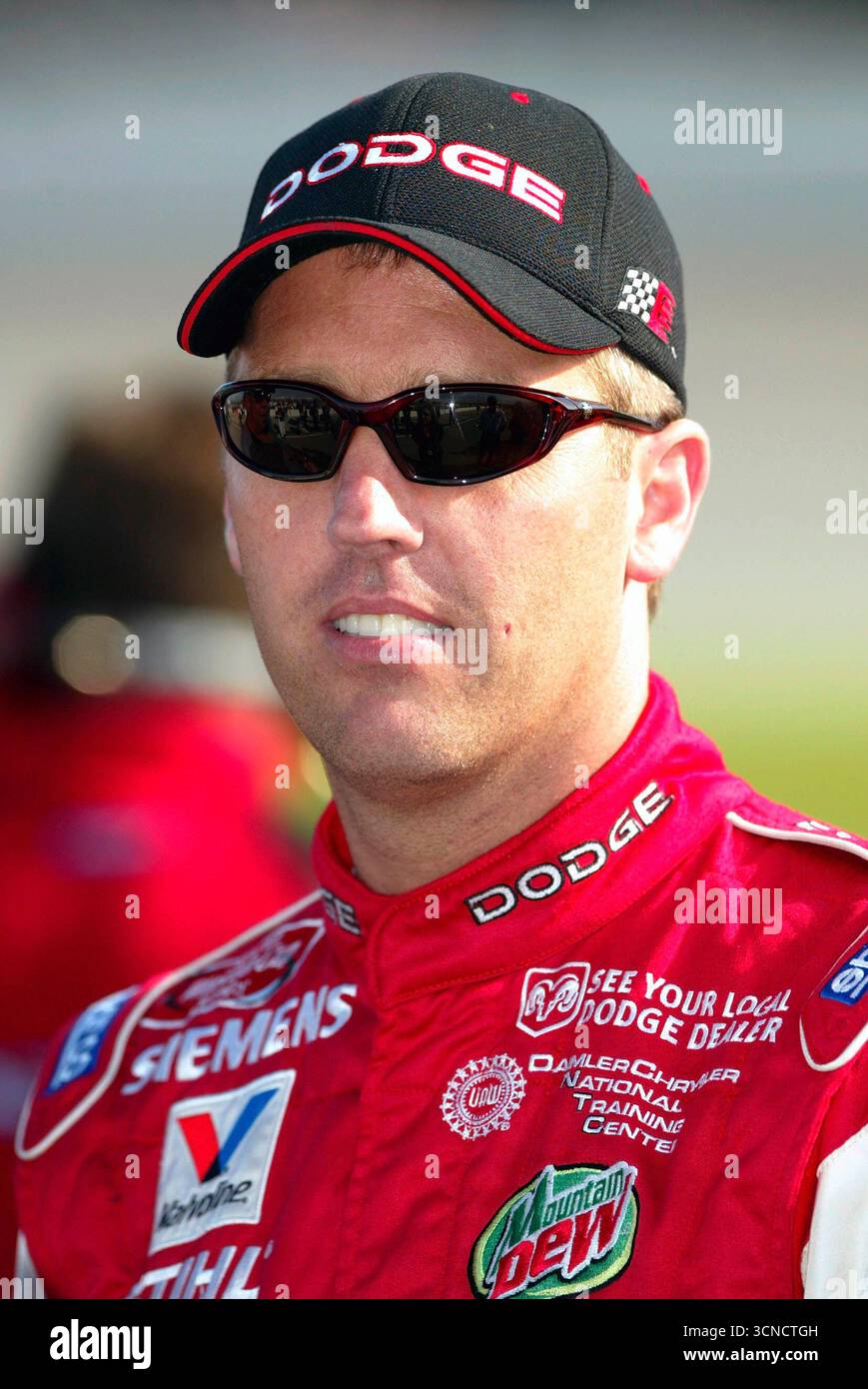 Jeremy Mayfield takes a moment to laugh with his crew during a practice ...