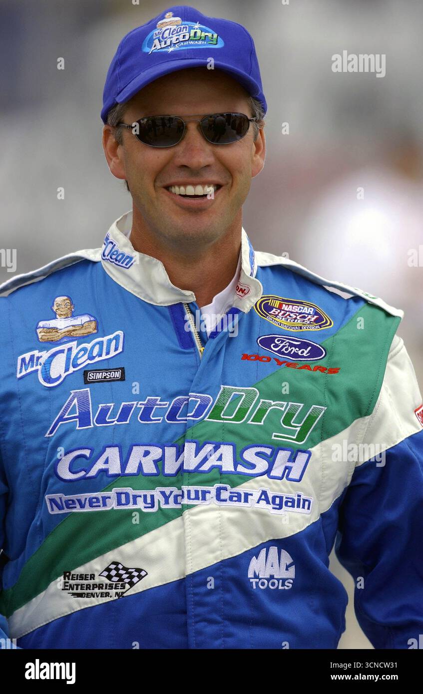 Wally Dallenbach smiles as he walkes out to qualify for the Banquet 400 ...