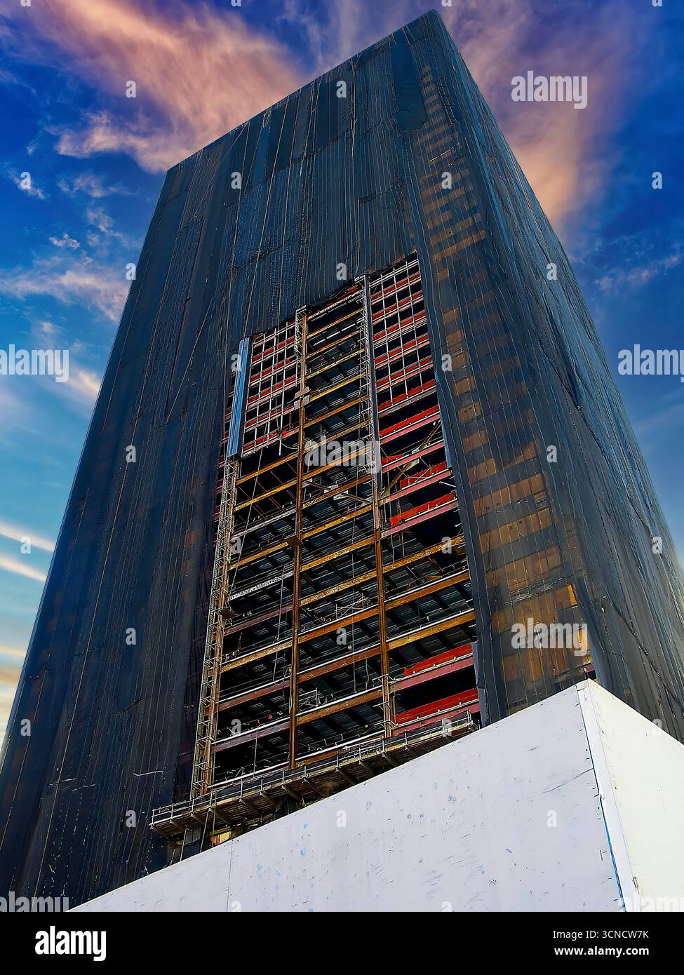 Ground Zero in 2003 reveals the aftermath of 9/11—rubble, cranes, and ...
