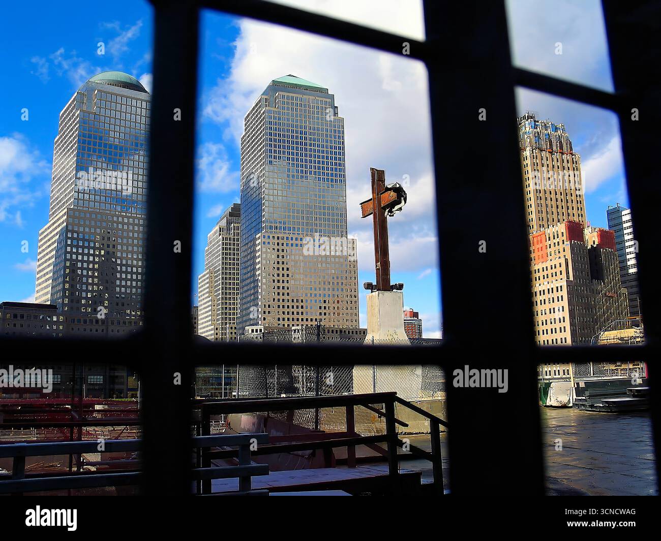 Ground Zero in 2003 reveals the aftermath of 9/11—rubble, cranes, and ...