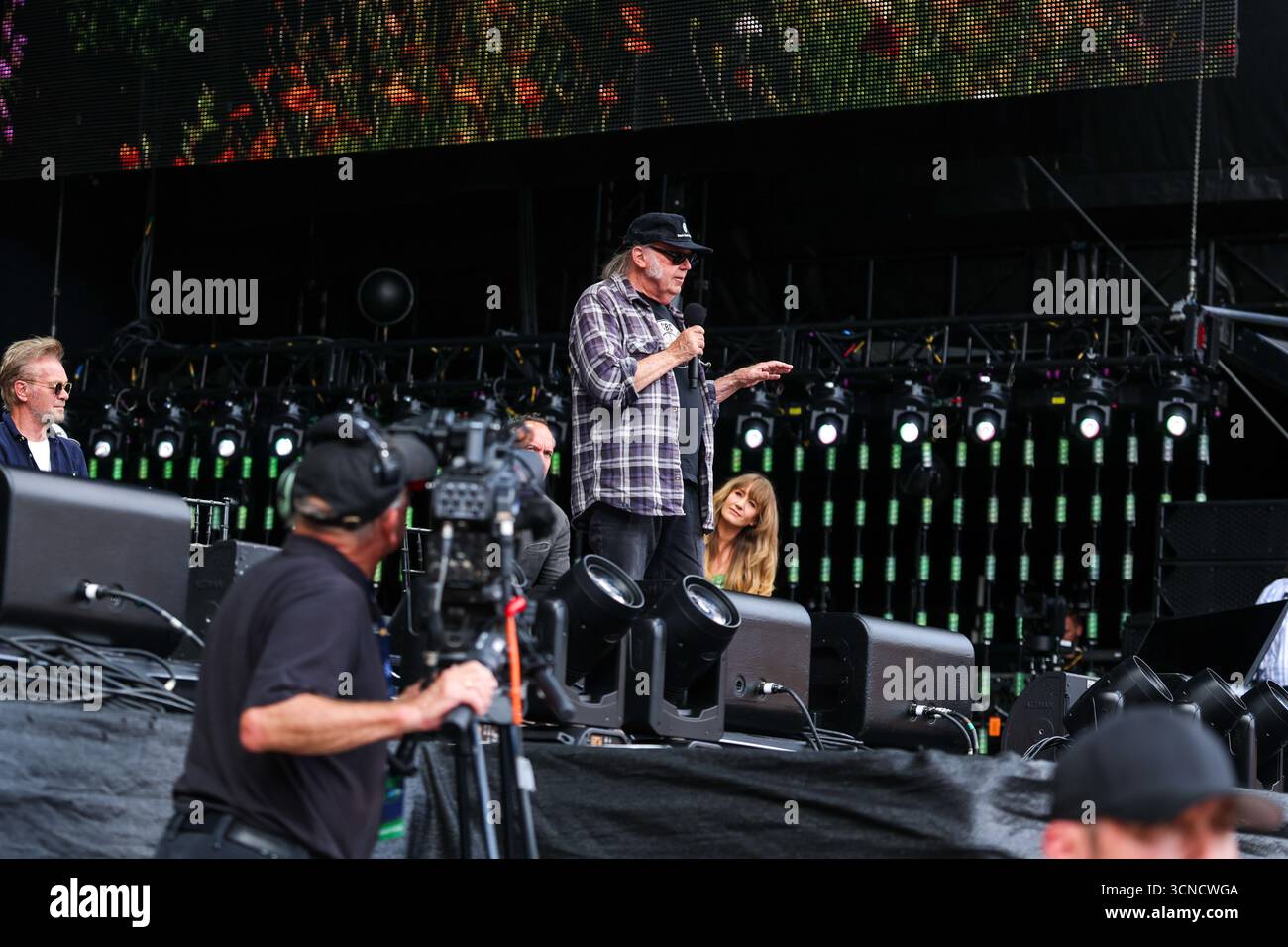 Neil Young speaks during a press conference at the Farm Aid 40 Music ...