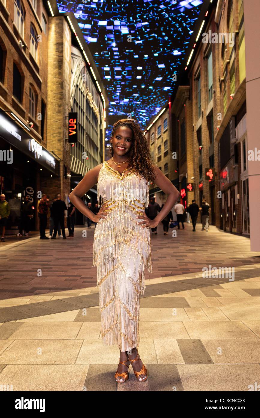 EDITORIAL USE ONLY Oti Mabuse leads a free family dance class at ...