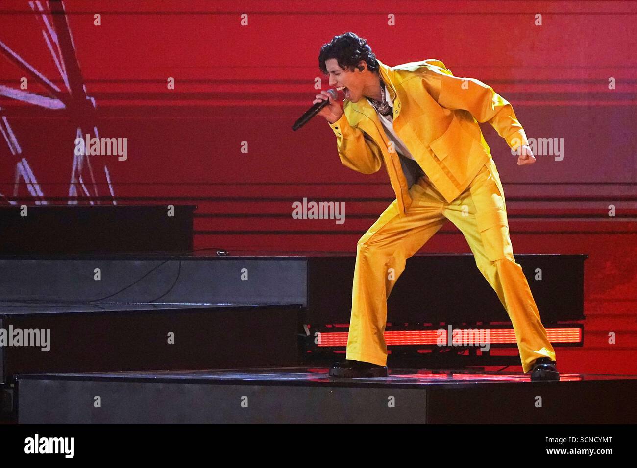 Tadjikistan's Farrukh Hasanov performs the song "Burn!" at the International Music Competition ...