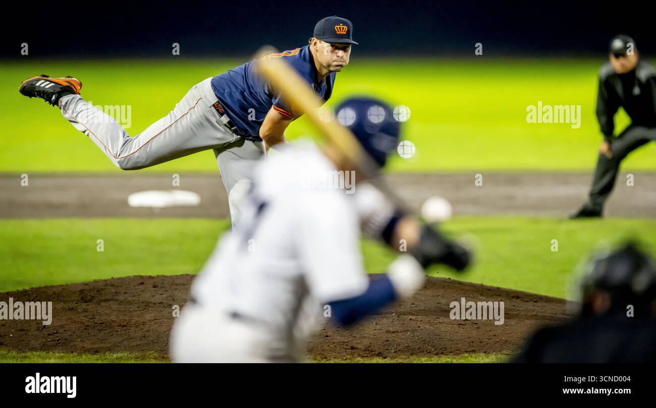 ROTTERDAM - Dutch baseball player Tom De Blok in action against Great ...