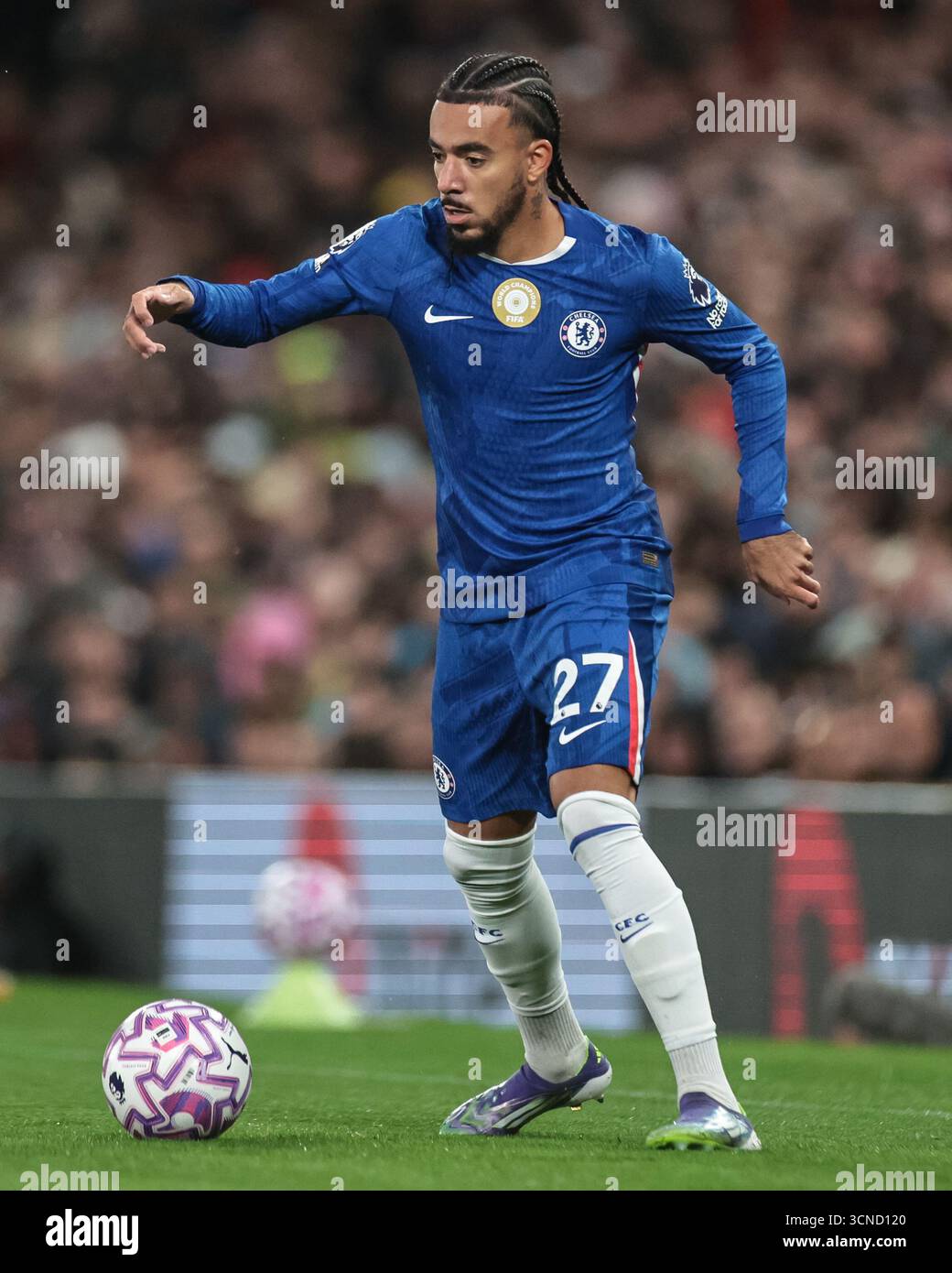 Malo Gusto of Chelsea with the ball during the Premier League match ...