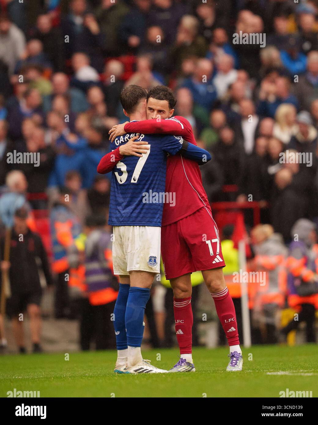 Liverpool's Curtis Jones and James Garner embrace after the Premier ...