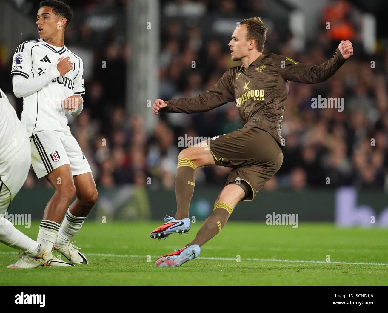 Brentford's Mikkel Damsgaard scores his side's first goal of the game ...