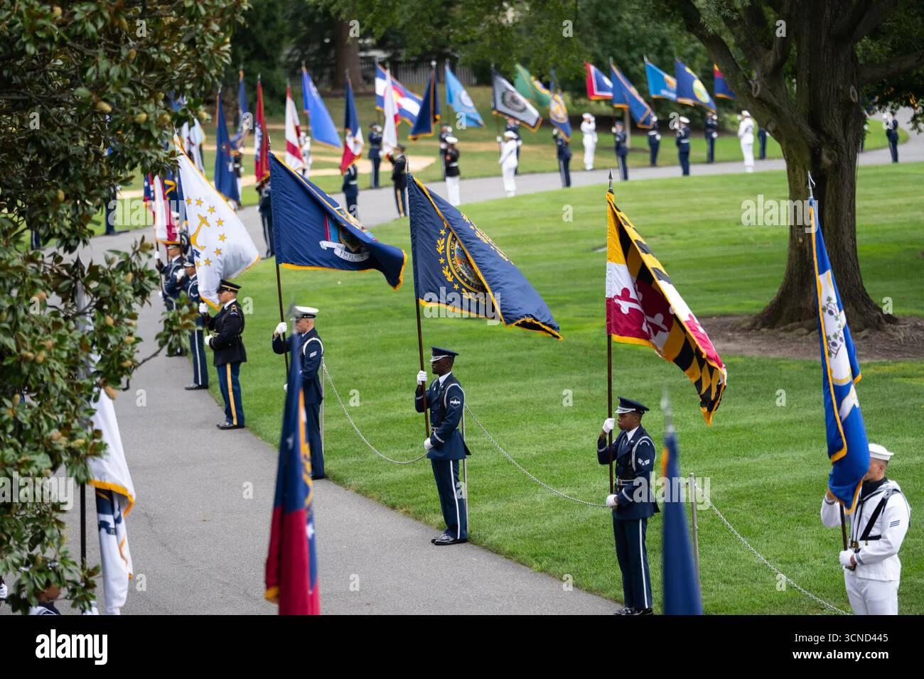 Military honor guard lines the driveway with state flags at the White ...