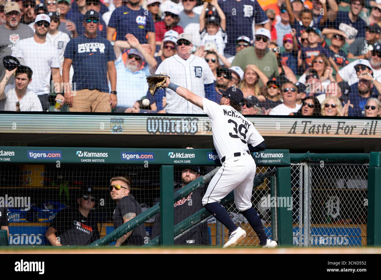 Detroit Tigers third baseman Zach McKinstry is unable to catch a foul ...