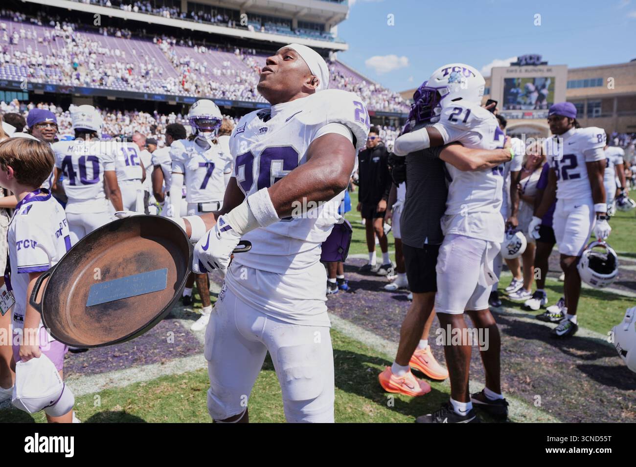 TCU running back Jeremy Payne (26) celebrates with the "iron skillet ...