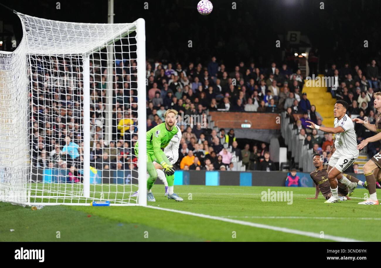 Brentford's Ethan Pinnock scores an own goal during the Premier League ...