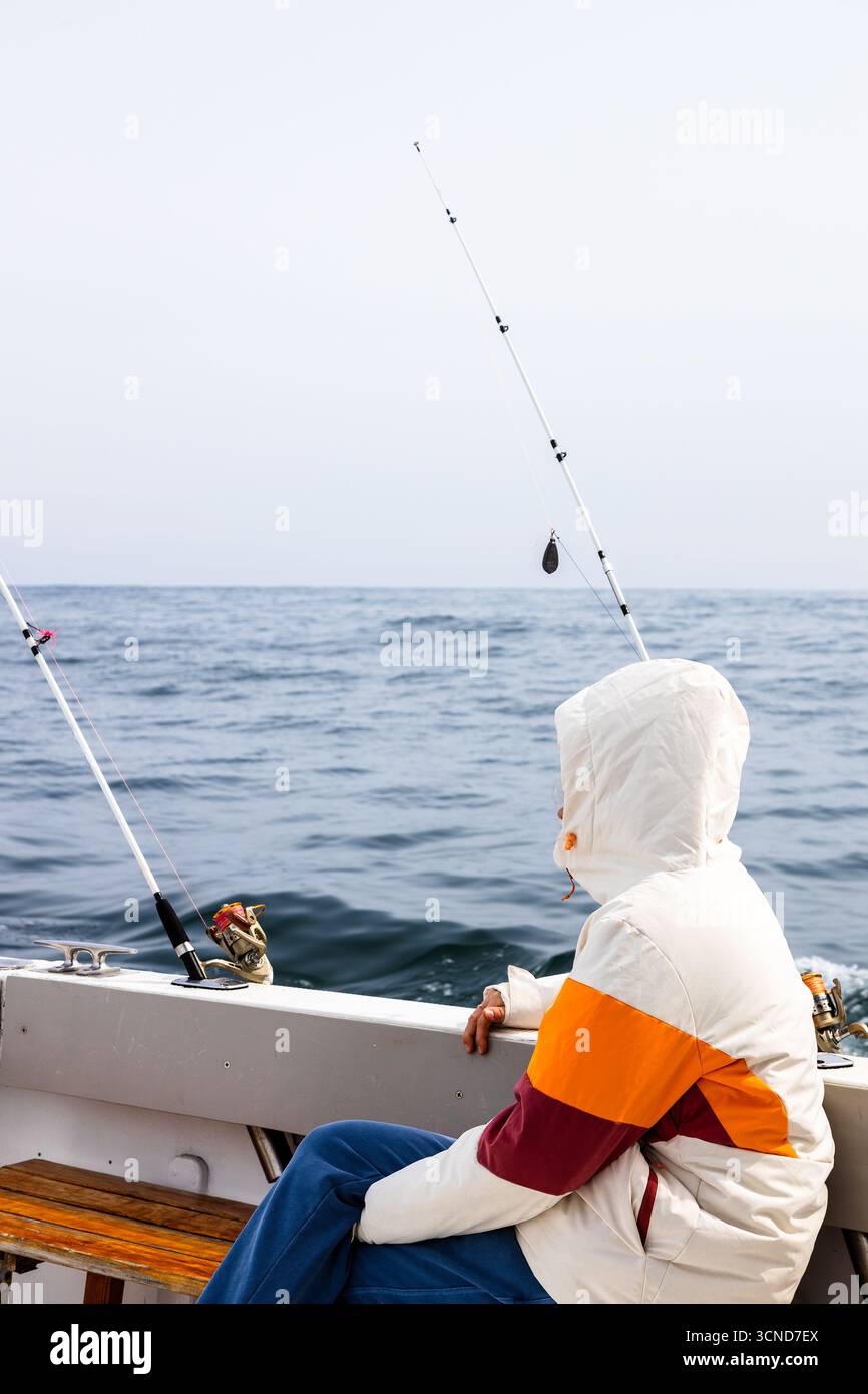 fishing from boat in Avacha bay near Petropavlovsk-Kamchatsky city in ...