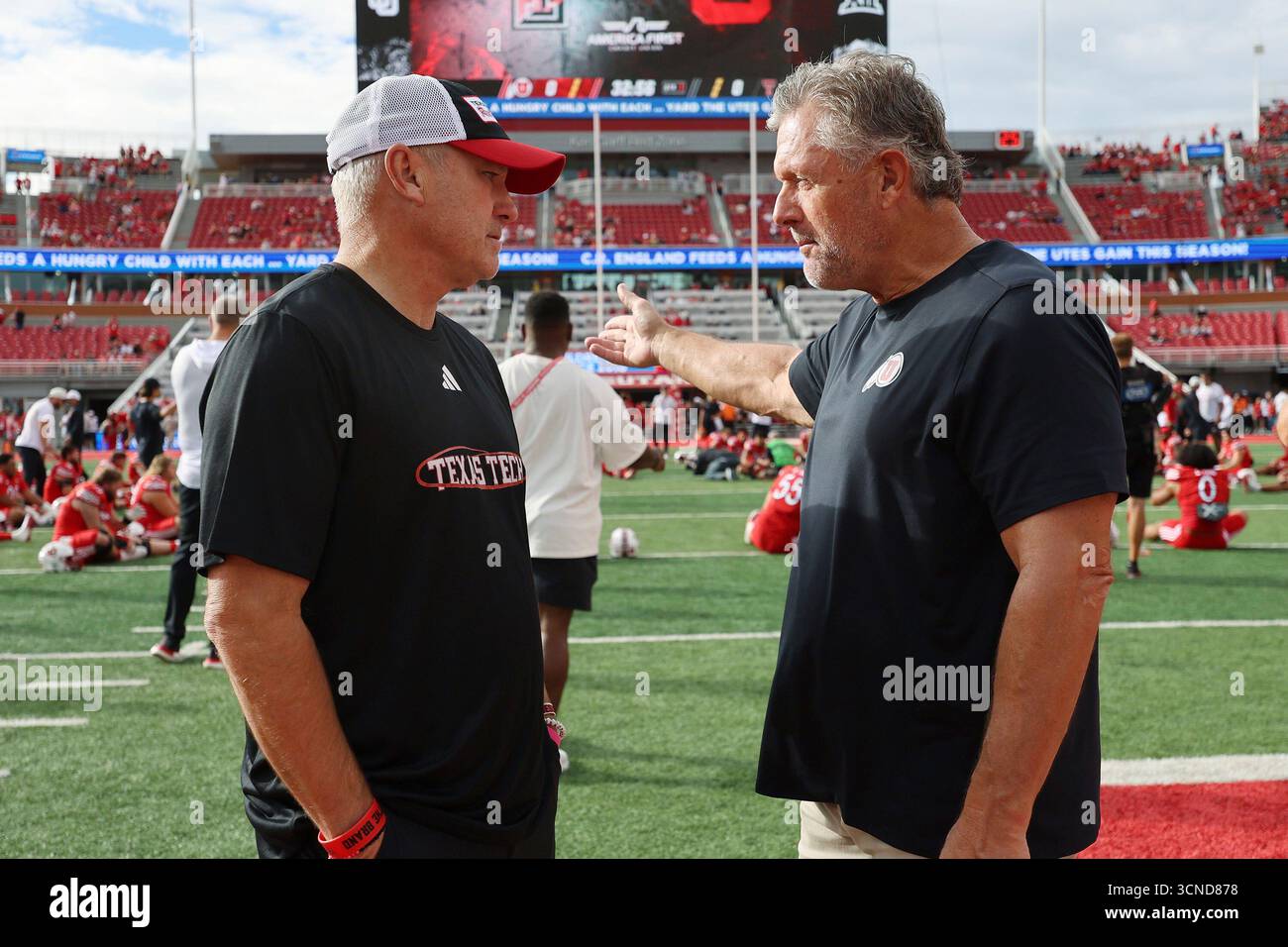 Texas Tech head coach Joey McGuire, left, and Utah head coach Kyle ...