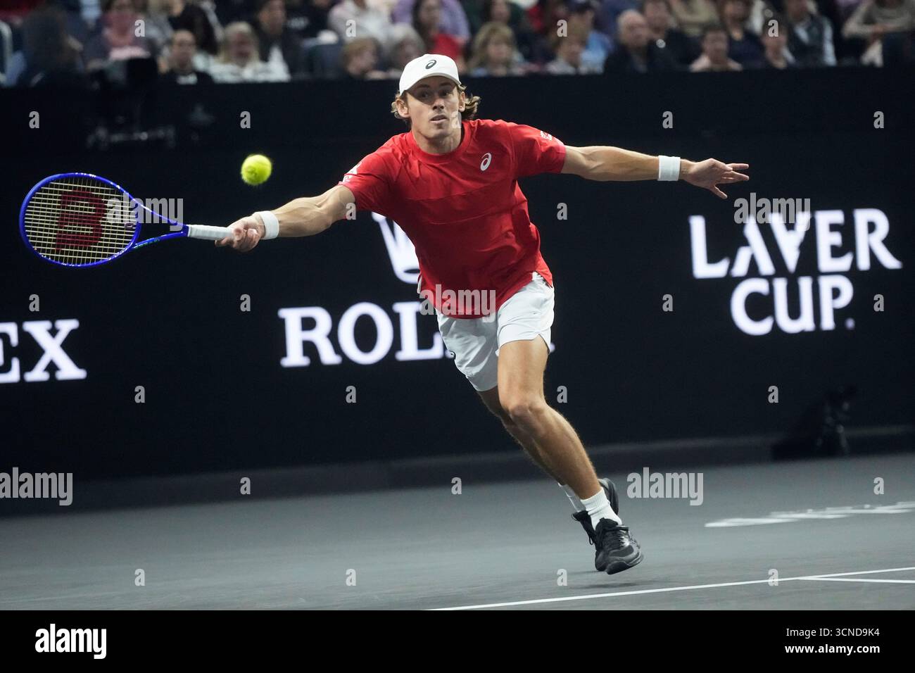 Team World's Alex de Minaur, of Australia, returns a shot against Team ...