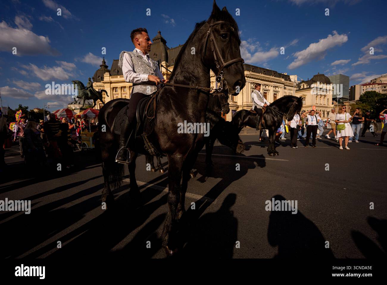 Artists of the Bucharest Metropolitan Circus ride horses during a ...