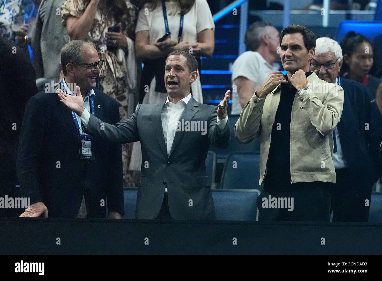 San Francisco Mayor Daniel Lurie, middle, gestures between Tony Godsick ...