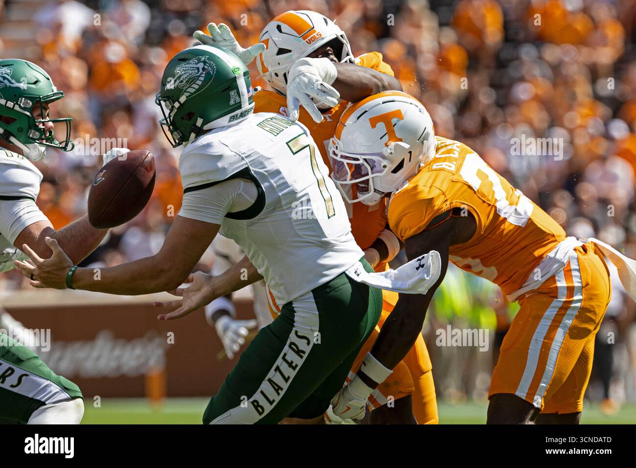UAB quarterback Jalen Kitna (7) fumbles the ball as he's hit by ...