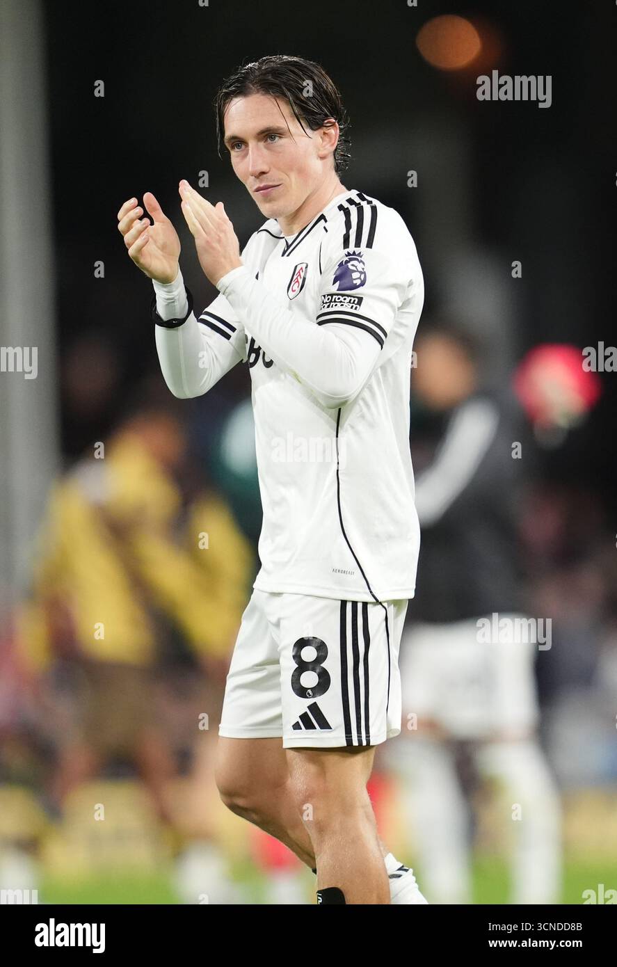 Fulham's Harry Wilson applauds the fans after the Premier League match at Craven Cottage, London ...