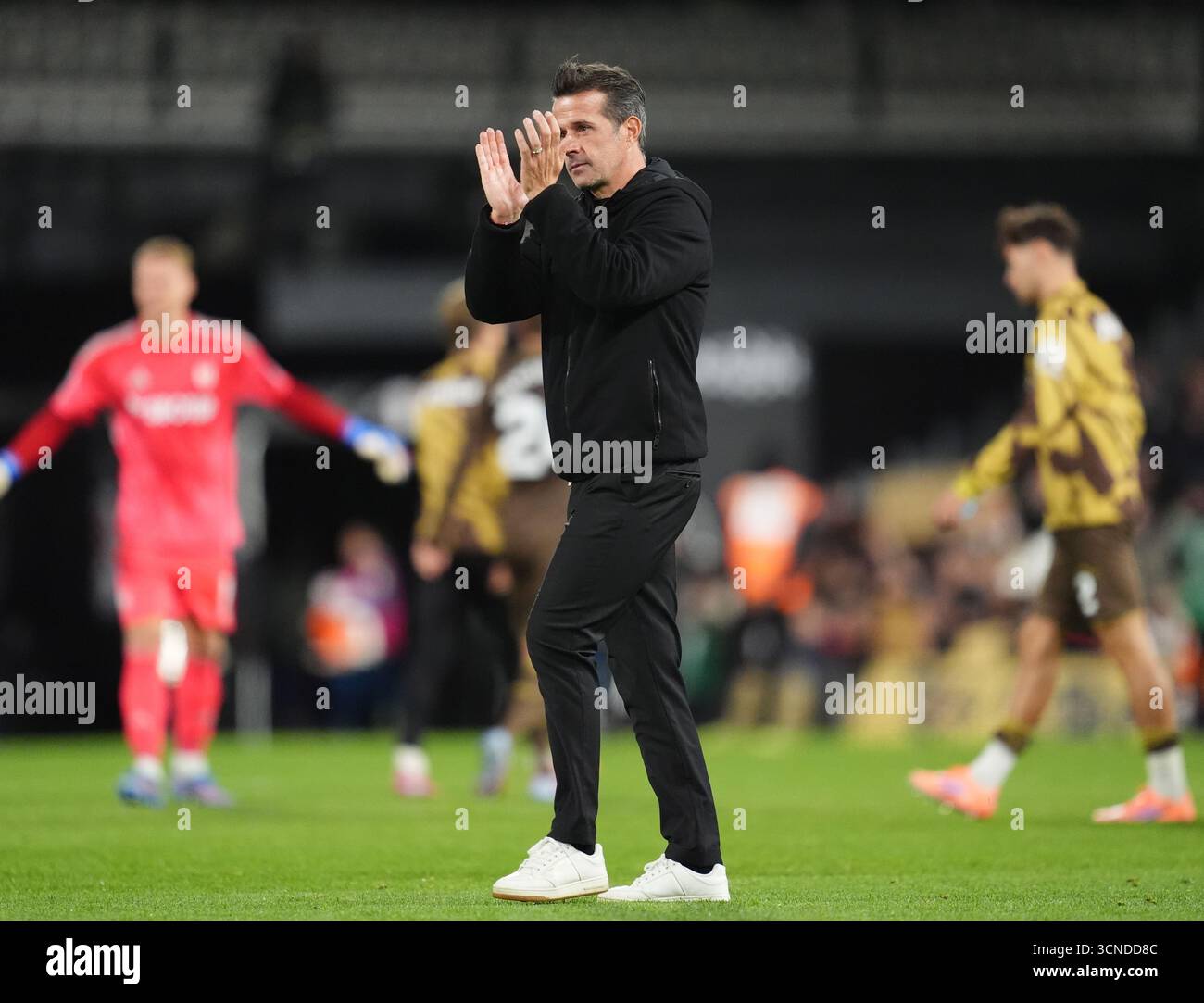 Fulham manager Marco Silva applauds the fans after the Premier League ...