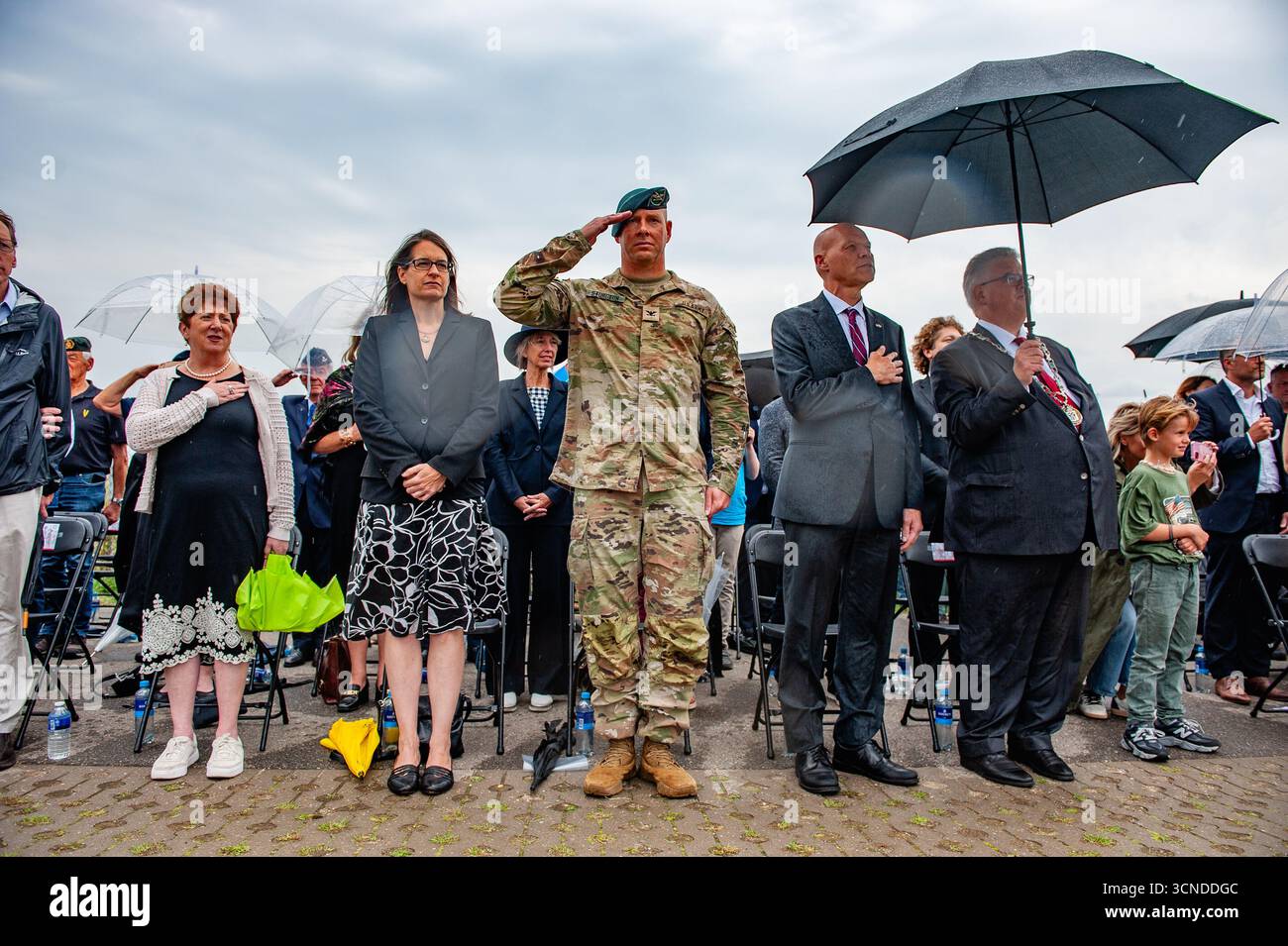 Hubert Bruls, Mayor of Nijmegen (the one with the umbrella) and next to ...