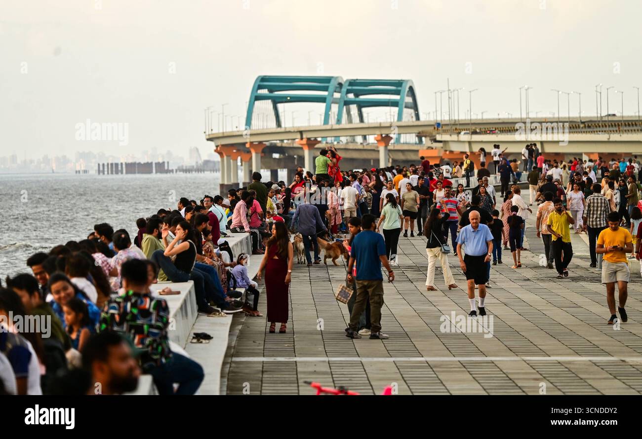 MUMBAI, INDIA - SEPTEMBER 20: People walking, jogging, cycling and ...