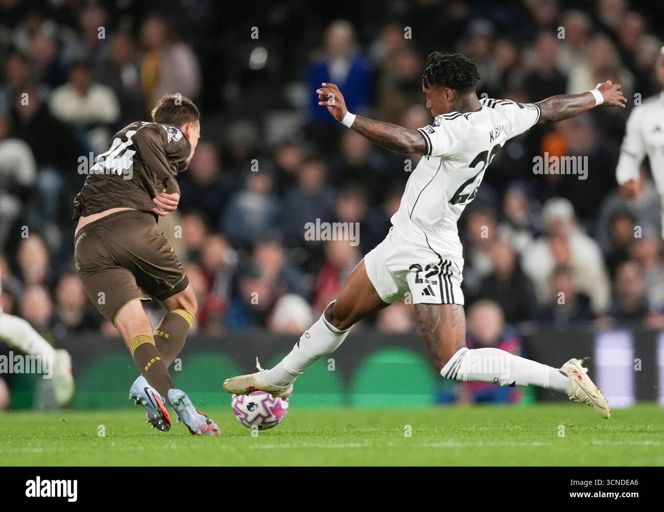 Fulham's Kevin tackles Brentford's Mikkel Damsgaard during the English ...